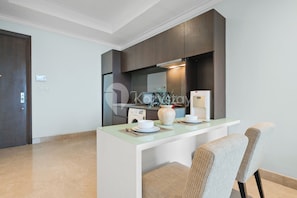 Apartamento, 1 quarto, Vista para a cidade | Sala de jantar