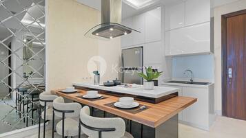 Apartamento, 2 quartos, Vista para a cidade | Sala de jantar