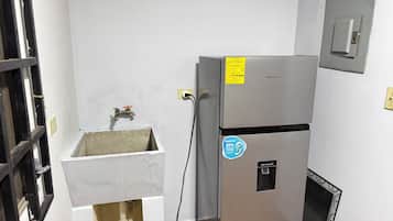 Apartamento Standard, 2 quartos | Cozinha privada | Um micro-ondas, uma cafeteira/bule