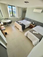 Quarto triplo conforto | Wi-Fi de cortesia, roupa de cama