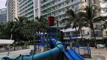 Apartamento em Condomínio Fechado, 1 quarto, fumadores | Área para crianças