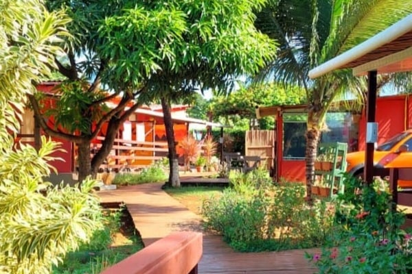 Suíte luxo, sacada, vista para o jardim | Terraço/pátio