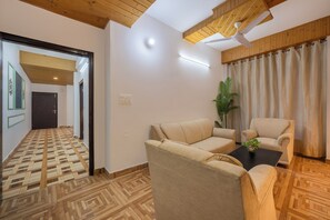 1 BHK Apartment with Steam Bath | Área de estar