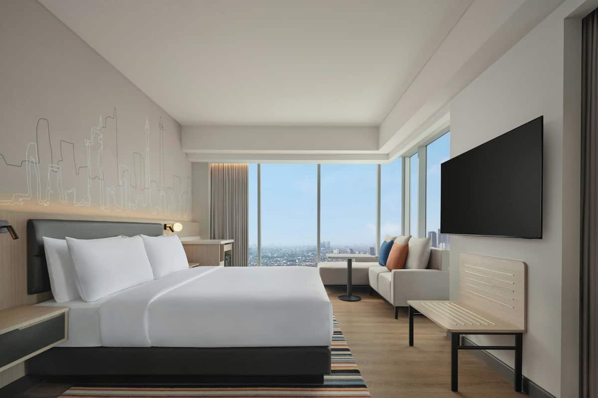 Quarto Panorâmico, 1 cama king-size, Vista para a cidade | Roupa de alta qualidade, edredões de penas, minibar, cofre no quarto