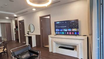 Apartamento superluxo, 2 quartos, 2 banheiros, vista para a cidade | Área de estar