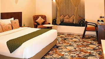 Quarto Deluxe, vista para o jardim | Cofre no quarto, secretária, Wi-fi grátis