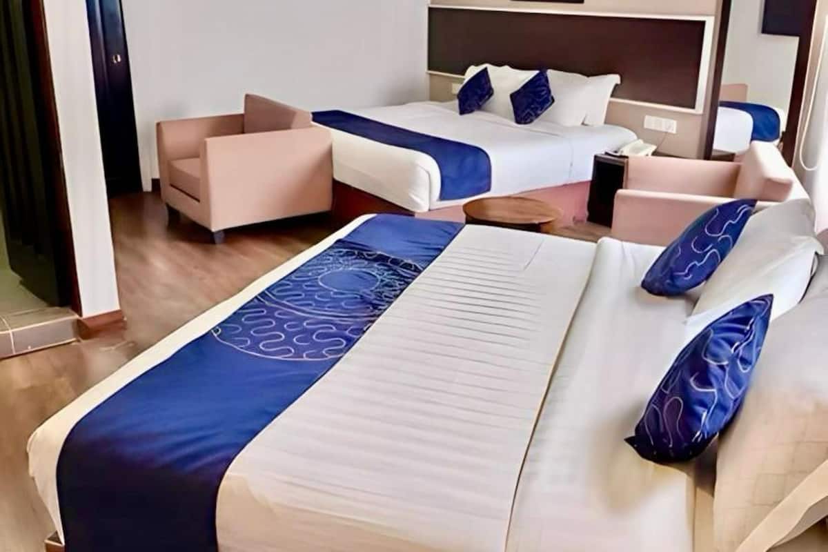 Quarto executivo, vista para a cidade | Escrivaninha, Wi-Fi de cortesia, roupa de cama