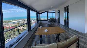 Suite, varanda, vista para o mar | Varanda