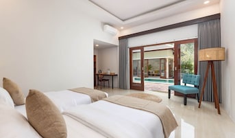 Bungalow Deluxe, 2 camas individuais | Cofre no quarto, cortinas/cortinados opacos, Wi-fi grátis