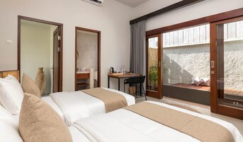 Bangalô luxo, 2 camas de solteiro | Cofres nos quartos, cortinas blackout, Wi-Fi de cortesia, roupa de cama