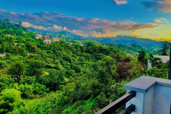 Quarto Duplo Standard, vista para a montanha | Vista para o jardim