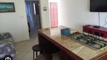 Apartamento, vista para o mar | Área de estar