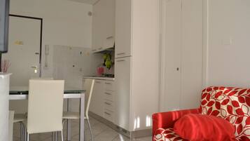 Apartamento, 1 quarto, sacada | Sala de estar