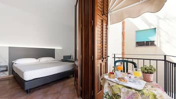 Quarto casal | Frigobar, cofres nos quartos, Wi-Fi de cortesia, roupa de cama