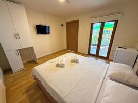 Quarto casal | Roupas de cama premium, frigobar, Wi-Fi de cortesia, roupa de cama