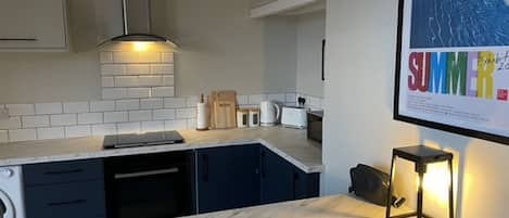 Apartamento | Cozinha privada | Uma chaleira elétrica