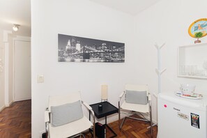 Apartamento | Sala de estar | Smart TV de 32 polegadas com canais digitais