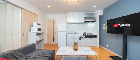 Apartamento Familiar, varanda | Sala de estar