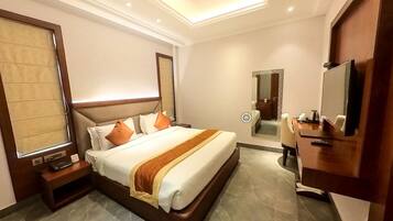 Roupa de alta qualidade, minibar, cofre no quarto