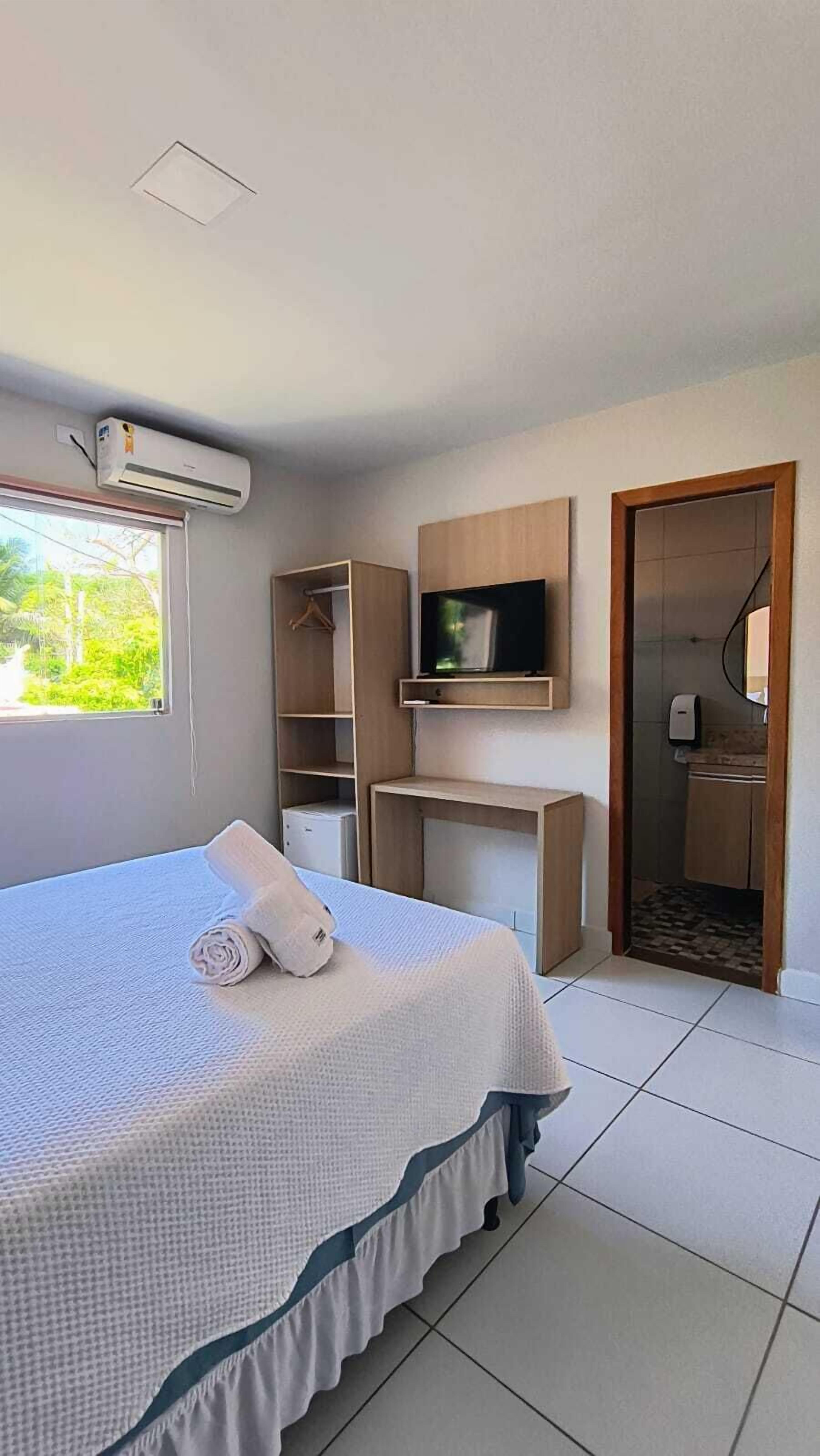 Quarto duplo conforto | Espaço de trabalho para notebook, Wi-Fi de cortesia