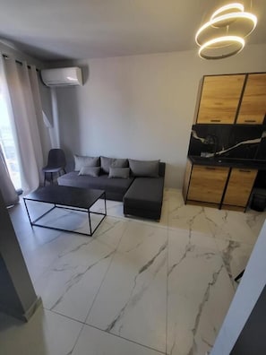 Suite Deluxe, varanda | Sala de estar