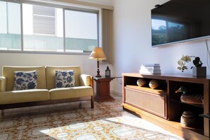 Apartamento | Sala de estar | Smart TV 