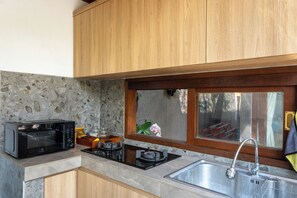 Vila família, sacada, vista para o jardim | Cozinha privada