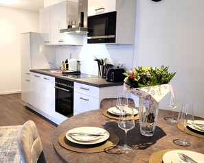 Apartamento | Cozinha privada | Utensílios de cozinha 