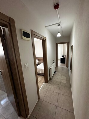 Apartamento standard, vista para a cidade | Área de estar