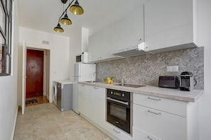 Apartamento Cidade, 1 cama de casal e sofá-cama, não fumadores | Cozinha privada | Uma máquina de café expresso, uma cafeteira/bule, uma chaleira elétrica