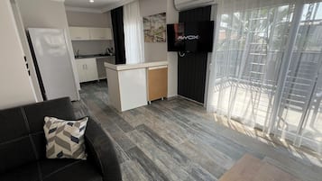 Quarto família, sacada, vista para o mar | Wi-Fi de cortesia