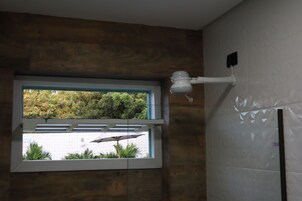 Quarto triplo standard, vista para o jardim