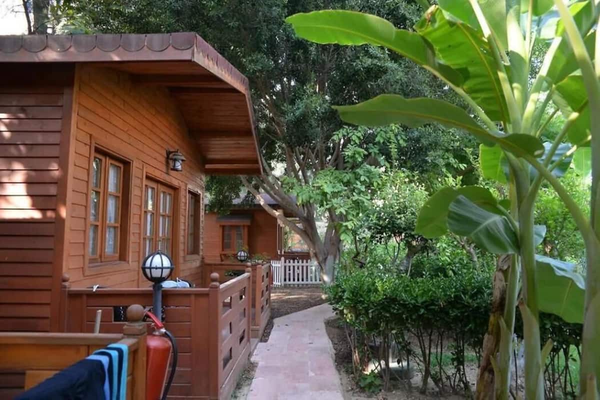 Bungalow Tradicional, varanda, vista para o jardim