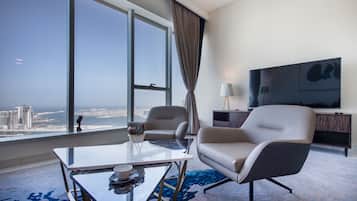 Apartamento luxo, vista para o mar | Área de estar