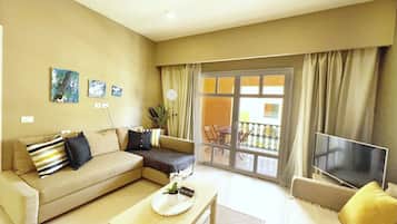 Apartamento básico | Área de estar | TV