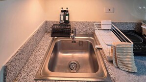 Apartamento em Condomínio Fechado, 1 quarto, acessível | Cozinha privada