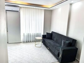 Comfort Apart , 1+1 | Sala de estar | Smart TV de 82 cm com canais via satélite 