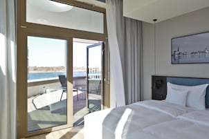 Apartamento conforto | Roupas de cama antialérgicas, edredons de pluma, frigobar