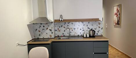 Apartamento | Sala de estar | TV de ecrã plano