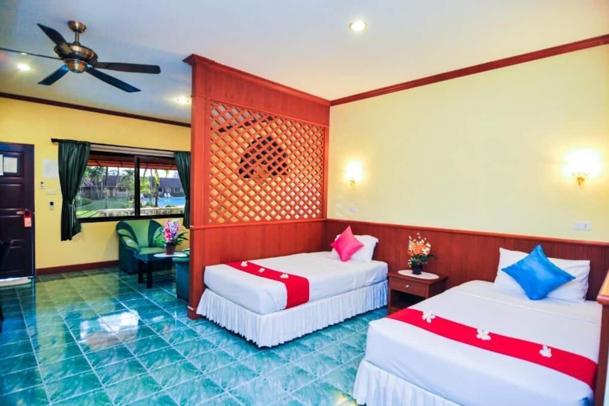 Suite Deluxe, 2 camas individuais, vista para o jardim | Cofre no quarto, Wi-fi grátis