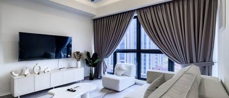 Apartamento superior, 3 quartos, sacada, vista para a cidade | Vista do quarto