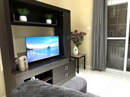 Apartamento Comfort, pátio | Sala de estar