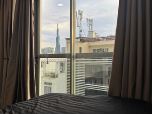 Apartamento, 2 quartos | Roupa de alta qualidade, camas de colchão pillowtop, secretária 