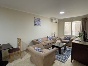 Apartamento luxo, vista para a cidade | Área de estar
