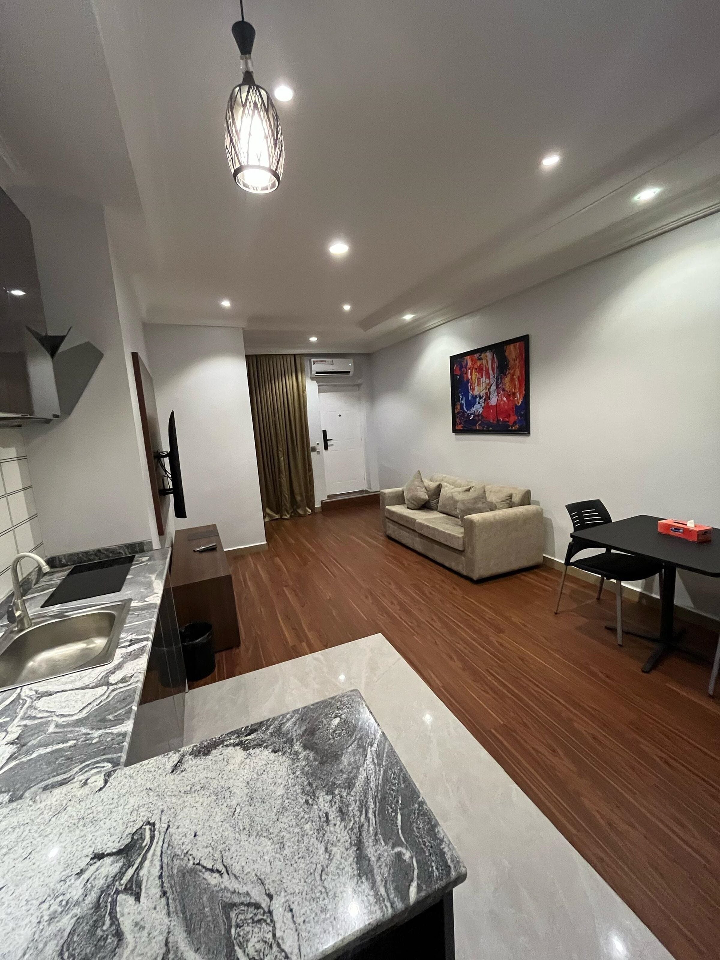 Quarto Individual Deluxe | Kitchenette privada | Minifrigorífico, uma placa de cozinha 