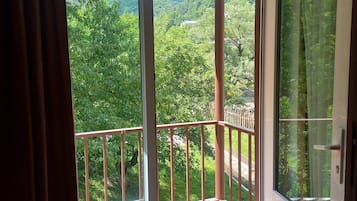 Quarto Quádruplo, varanda, vista para o jardim | Terraço/pátio interior