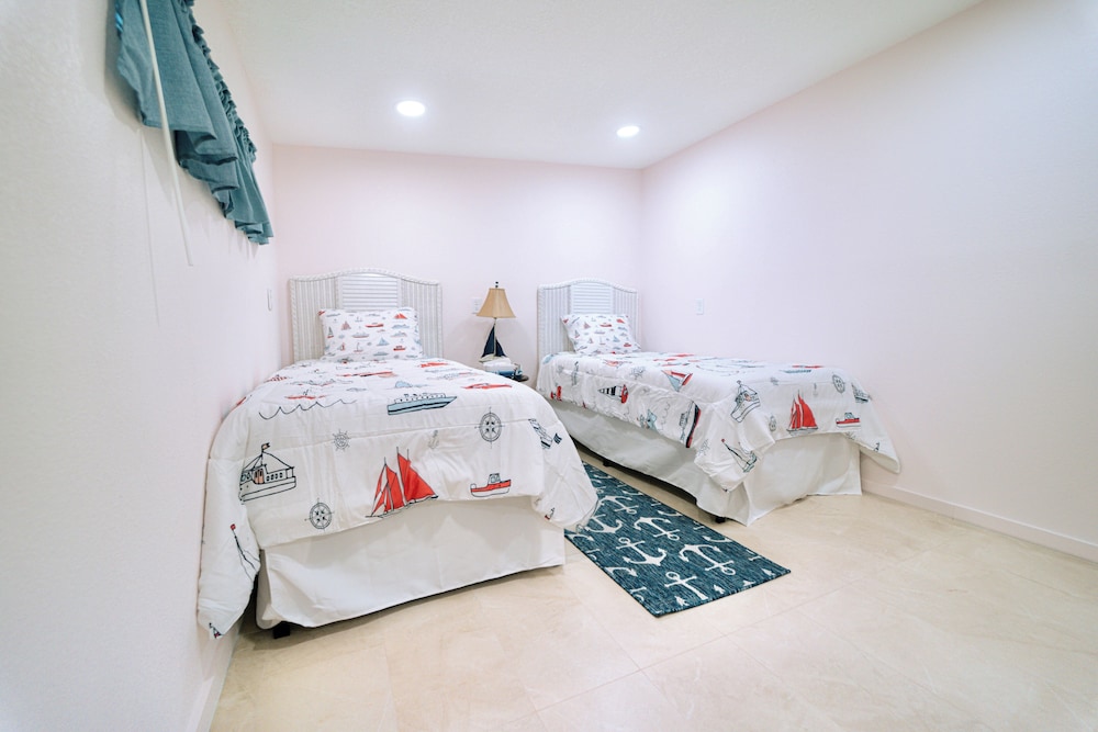BRAND NEW! Waterfront Home With Pool, Hot Tub and Canal Access in ...