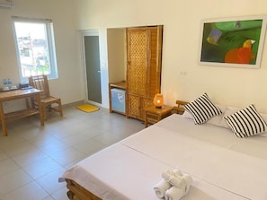 Quarto standard, vista para o jardim | Quartos à prova de som, Wi-Fi de cortesia, roupa de cama