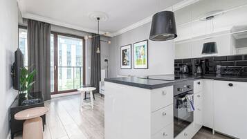 Apartamento, varanda | Kitchenette privada