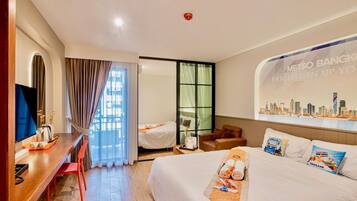 Suite Júnior, 2 quartos | Secretária, Wi-fi grátis, roupa de cama fornecida